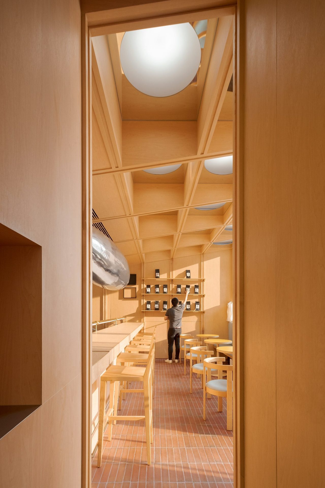 *캐빈인더 씨티 Various Associates designs C2 Cafe & Bar as a wooden "cabin in ...