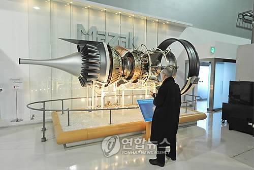 JAPAN ECONOMY MAZAK OPTONICS CORP.