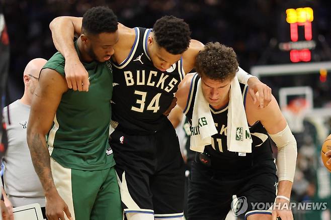 아데토쿤보 다리 부상nba 밀워키 승리하고도 걱정