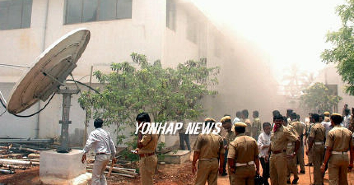 India Newspaper Attack (AP)