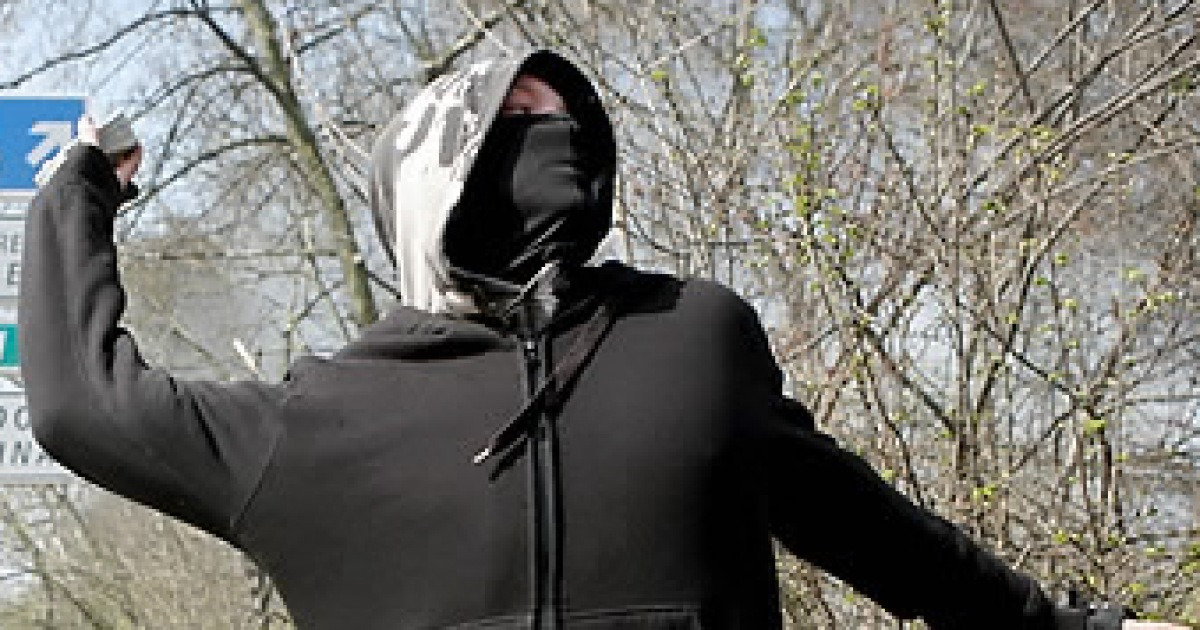 FRANCE INTERIOR MINISTER AND MASKED PROTESTOR