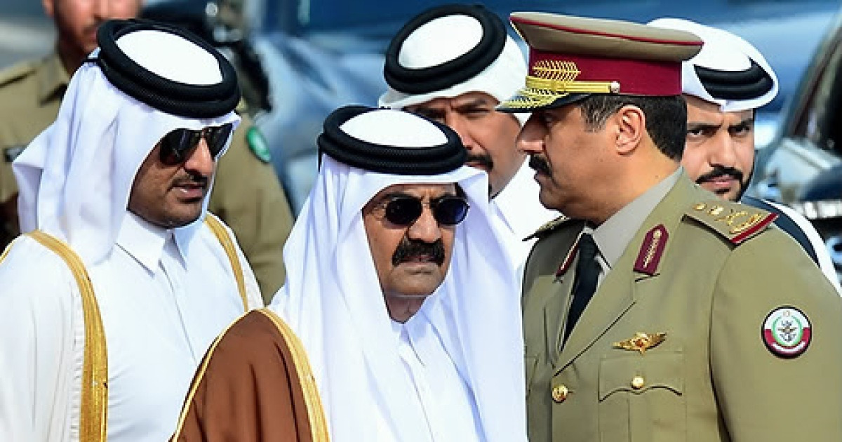 FILE QATAR EMIR HANDS POWER