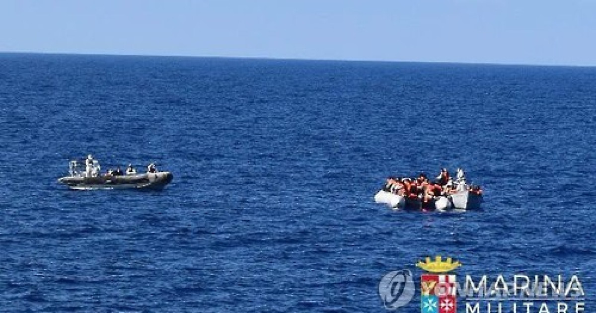AT SEA MIGRATION REFUGEES RESCUED