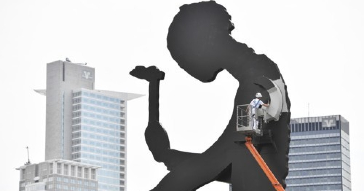 Germany Hammering Man