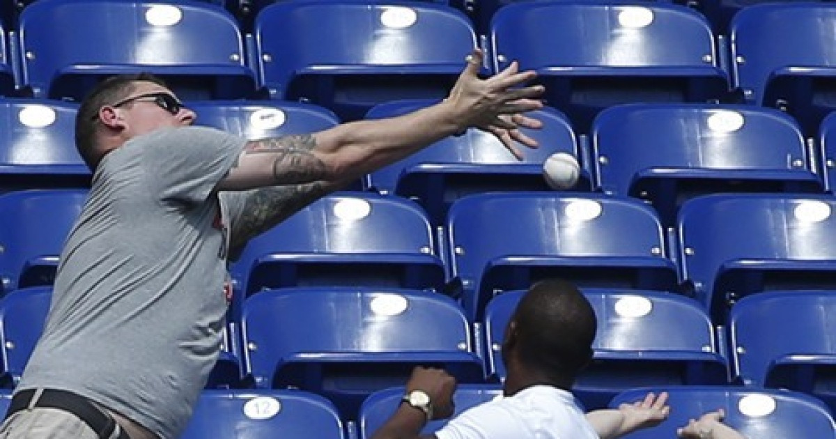 Foul Ball Catches Baseball