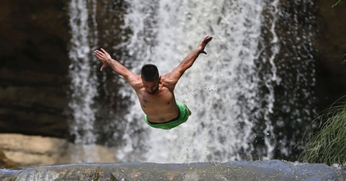 Kosovo High Diving Waterfall