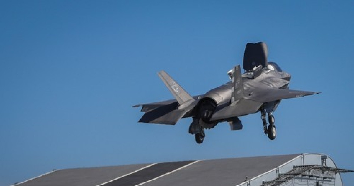 AT SEA BRITAIN USA DEFENCE F35 LANDS ON CARRIER