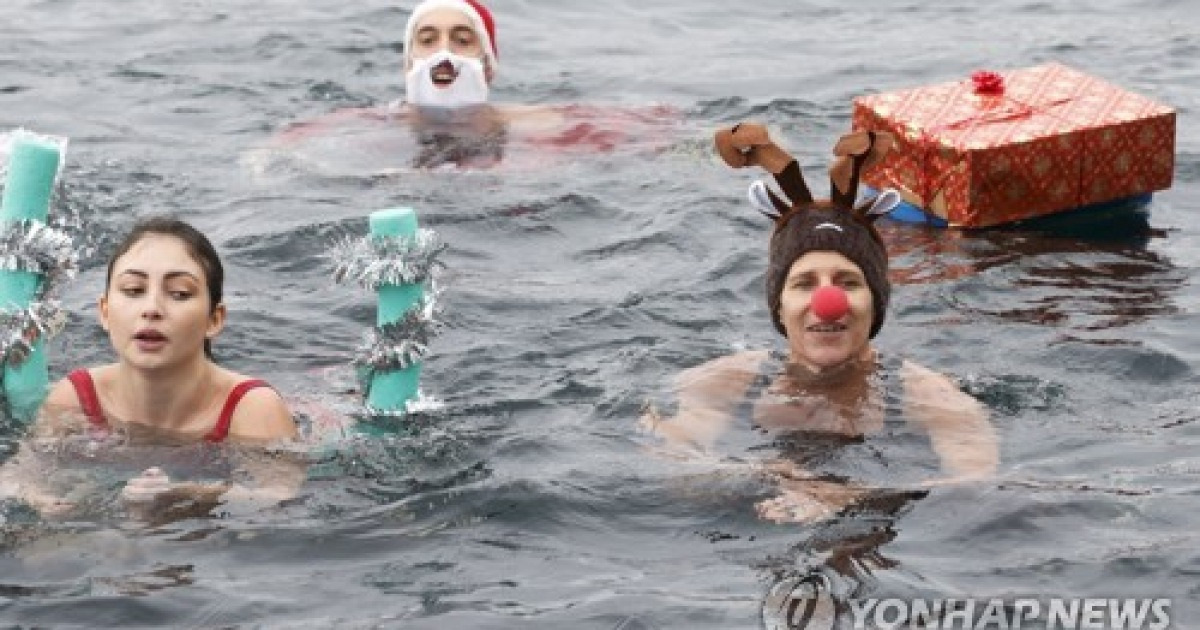 SWITZERLAND CHRISTMAS SWIMMING