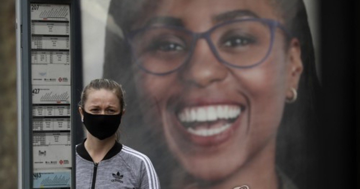 Virus Outbreak Britain Masks