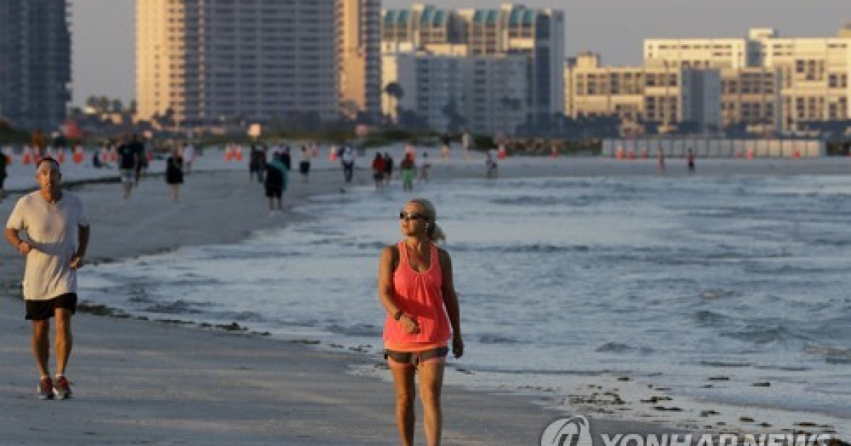 Virus Outbreak Florida Beaches Reopens