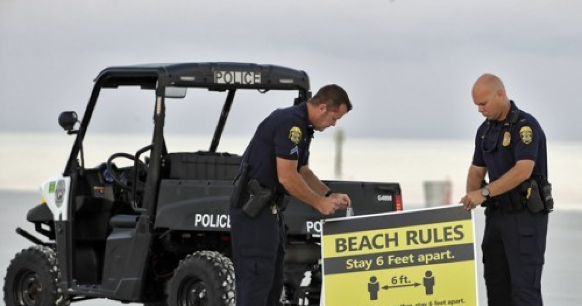 Virus Outbreak Florida Beaches Reopens