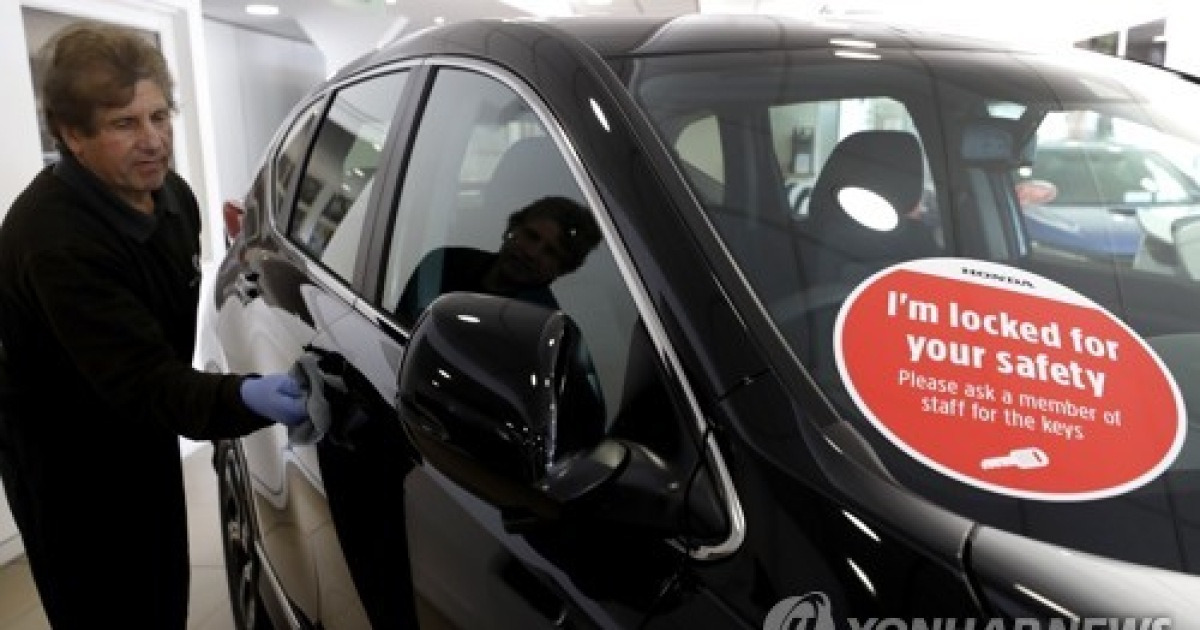 Virus Outbreak Britain Car Sales