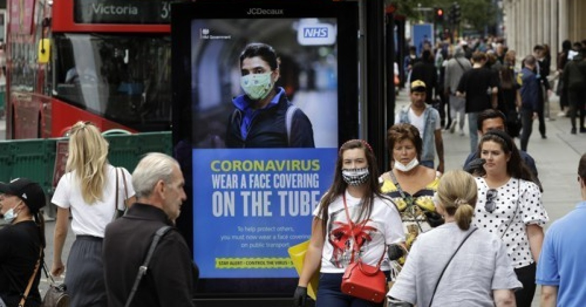 Virus Outbreak Britain Shops Reopen