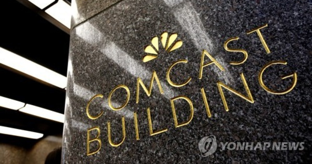 (FILE) USA ECONOMY COMCAST