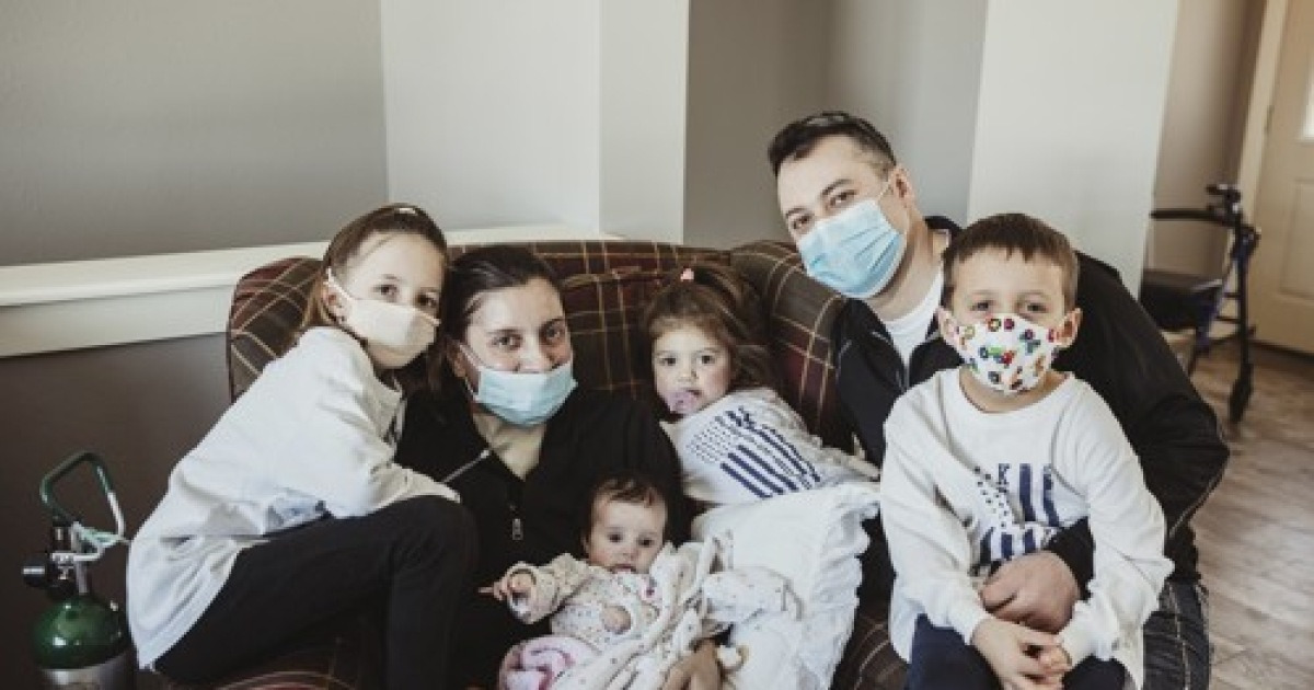 Virus Outbreak Wisconsin Coma Delivery