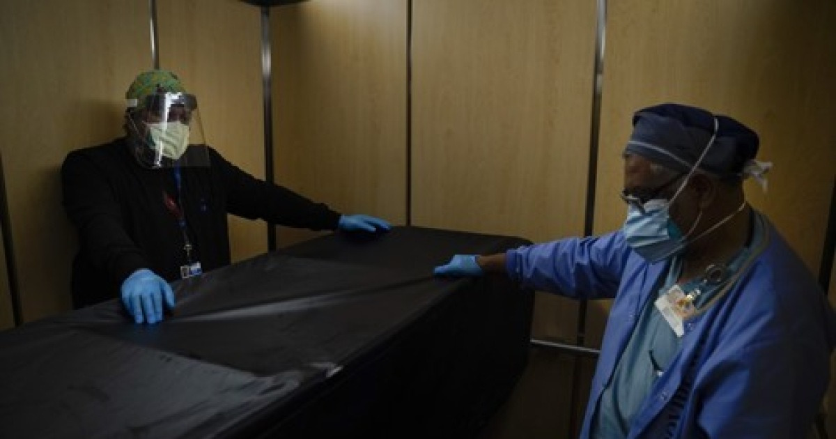 Virus Outbreak US Surge