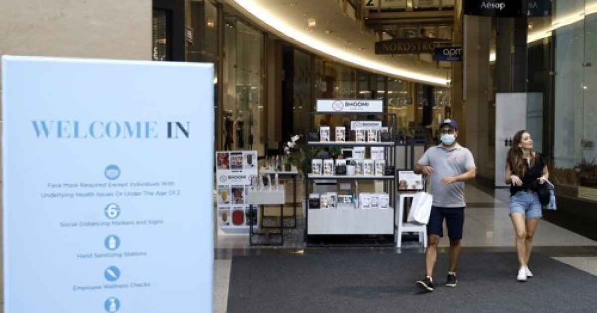 Shoppers Return to stores