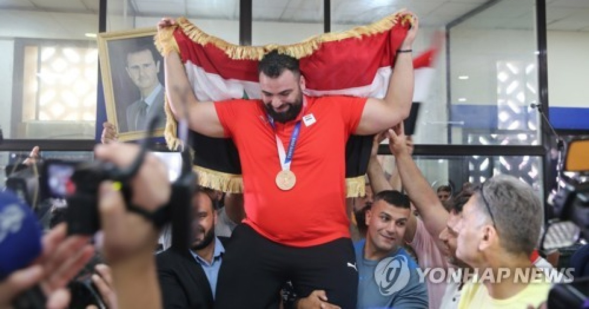 SYRIA OLYMPICS ATHLETE ASAAD RETURN
