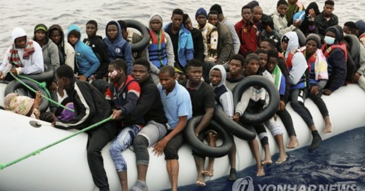 APTOPIX Migration Libya