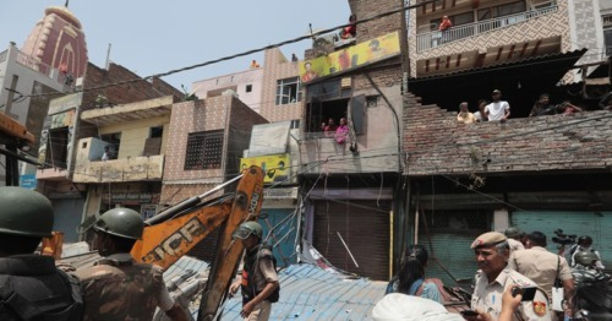 epaselect INDIA ILLEGAL CONSTRUCTION DEMOLITION IN RIOT HIT AREA