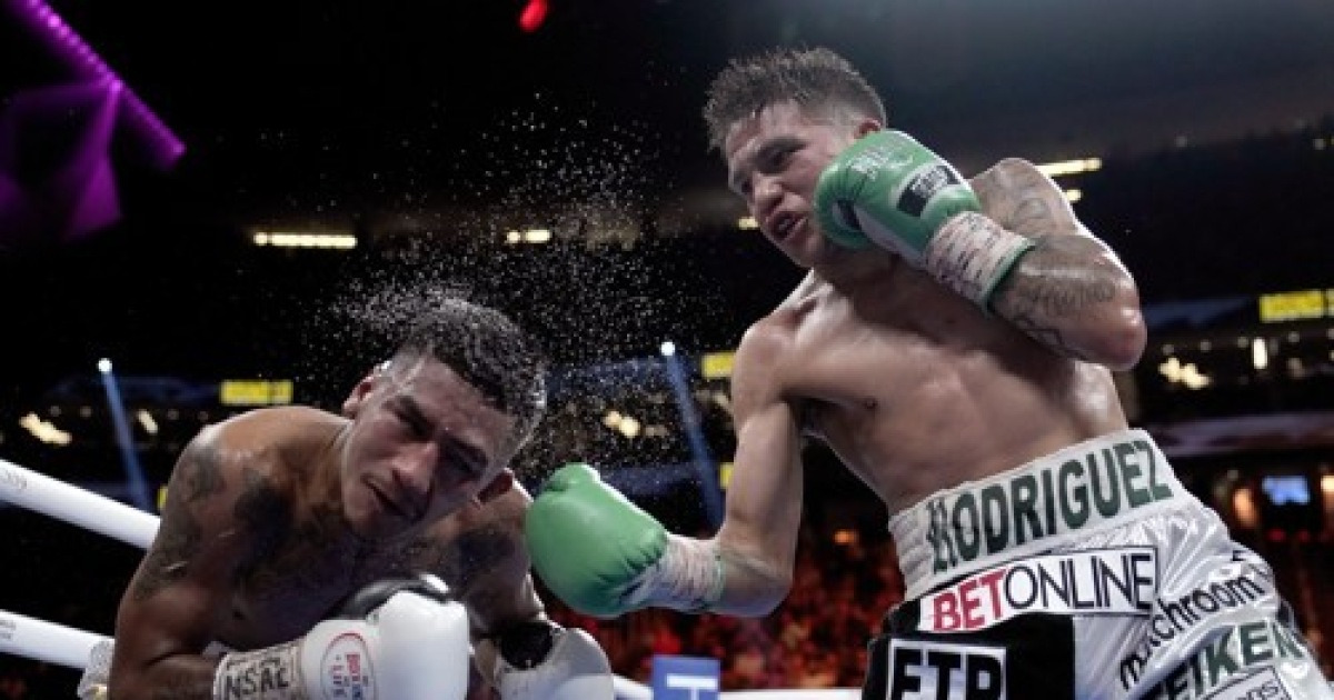 APTOPIX Rodriguez Gonzalez Boxing