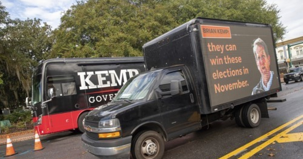 Protesters Attend Brian Kemp Campaign Bus Tour