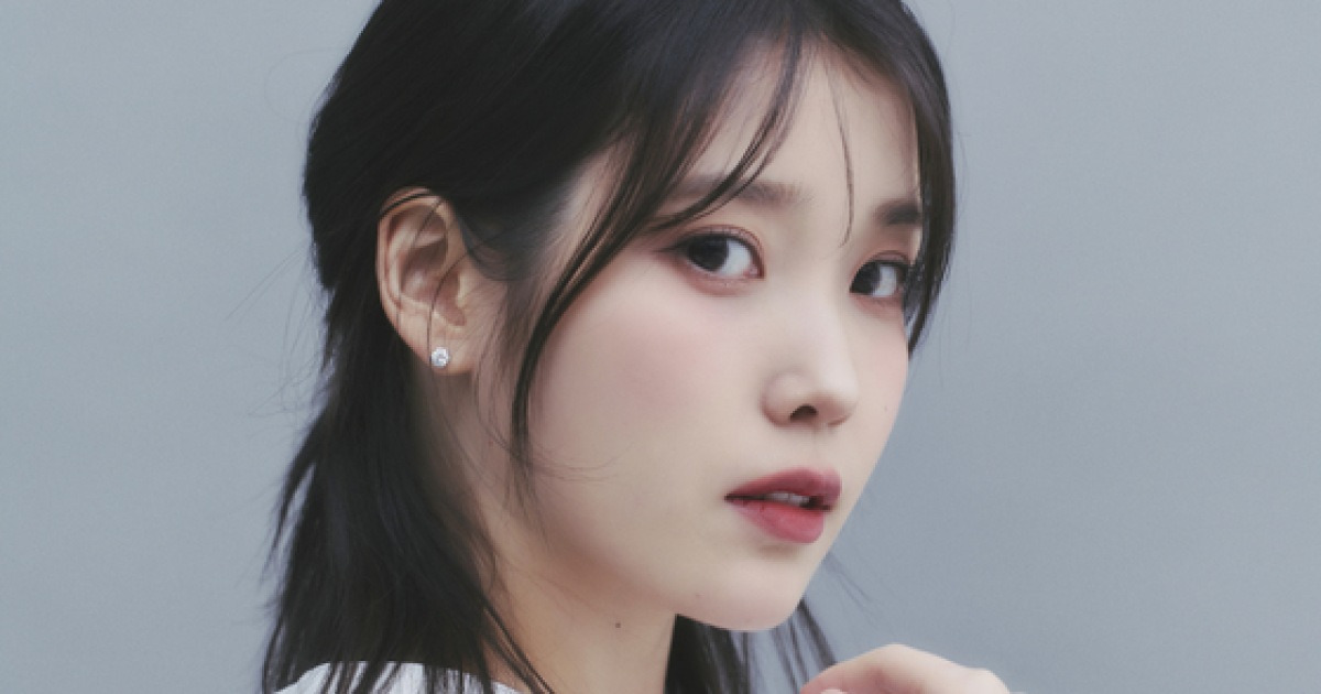 IU says cheerful character attracted her to latest film 'Dream'
