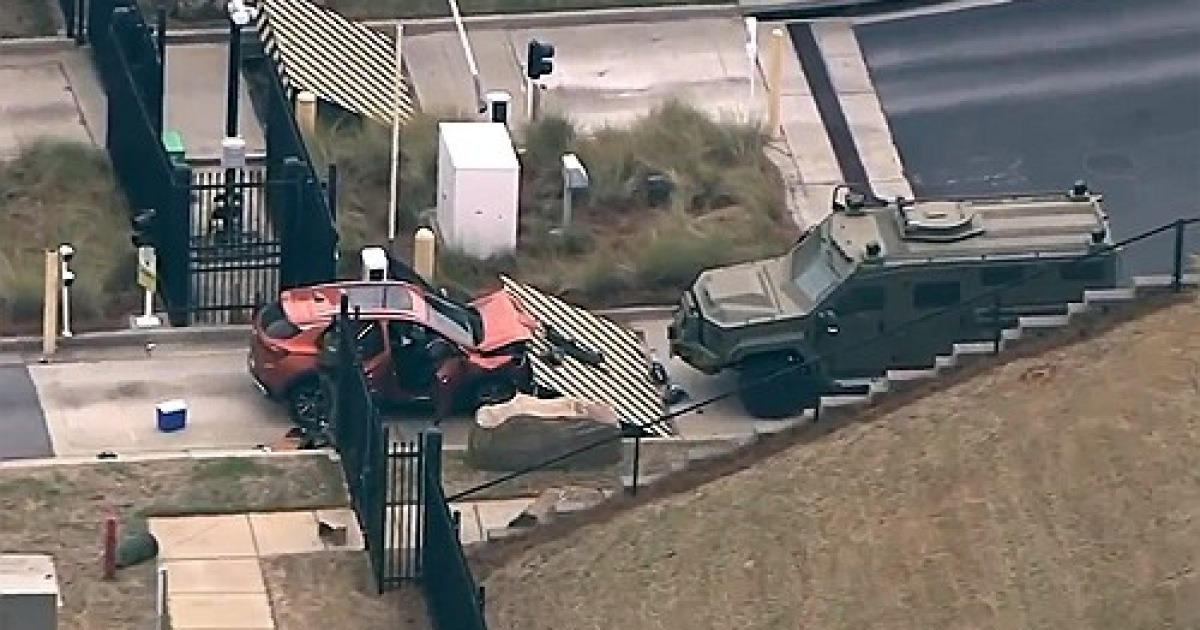 Vehicle Hits FBI Gate