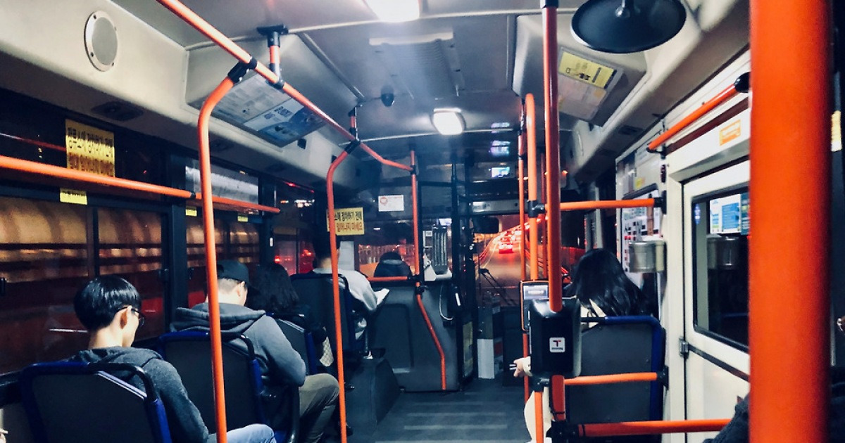 Citizens save woman pinned under a bus