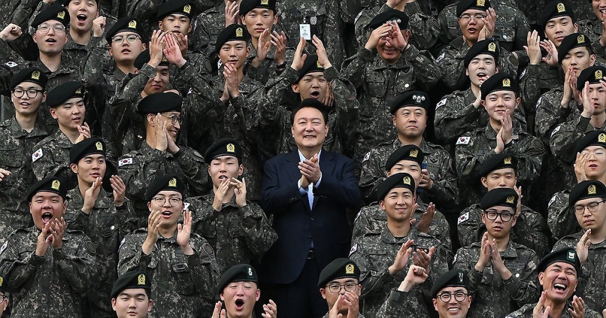 President Yoon visits BTS leader's Army unit to encourage soldiers on ...
