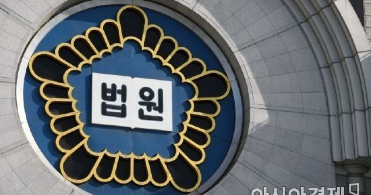 100원짜리 동전 속 이순신 영정 한은이 무단 사용 주장한 화백 유족들