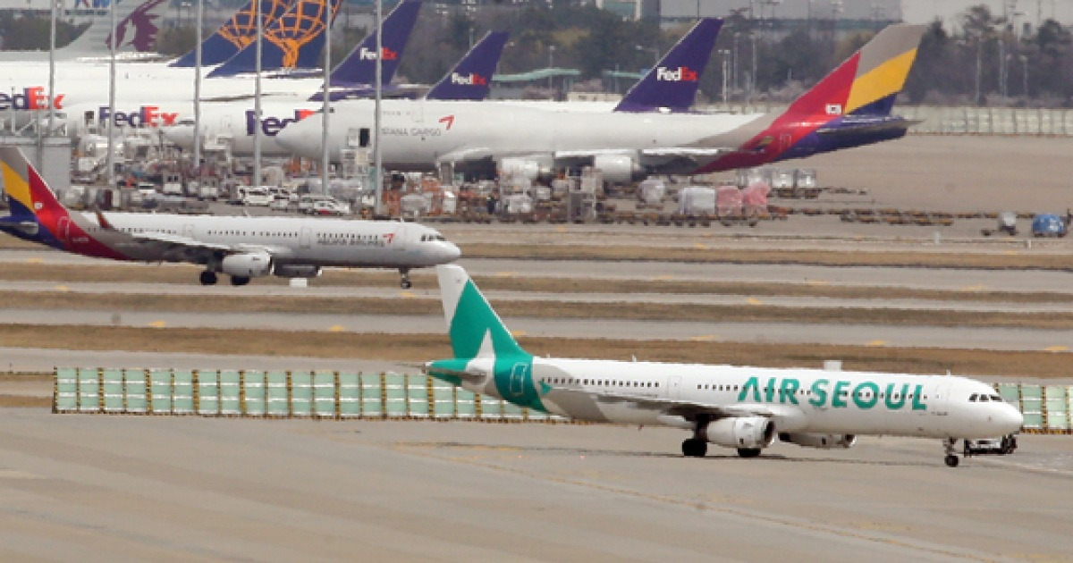 Air Seoul plane stops mid-taxi as 'stuffy' passenger opens emergency exit