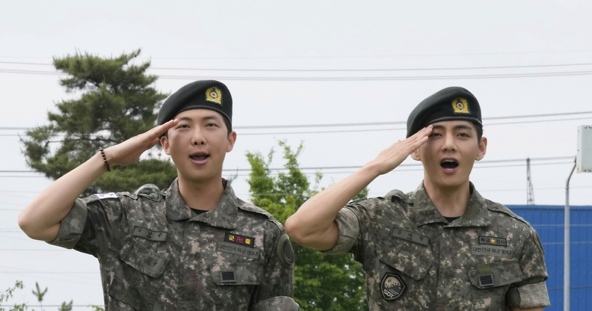 No longer soldiers, BTS's RM and V march back to ARMY